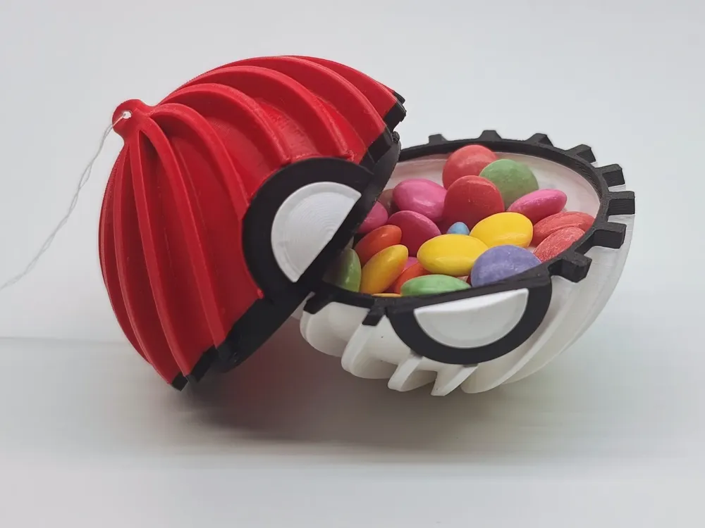 Christmas surprise ball in Pokeball style by Made With Lay3rs - MakerWorld