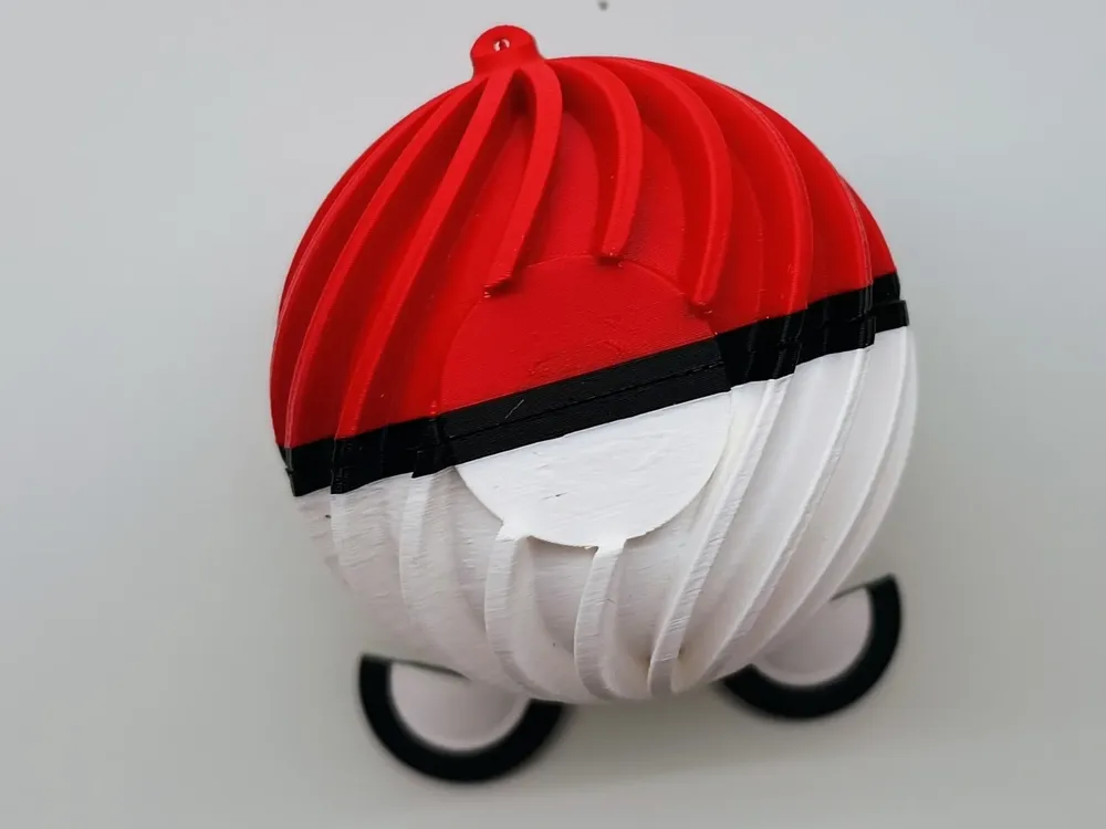 Christmas surprise ball in Pokeball style by Made With Lay3rs - MakerWorld