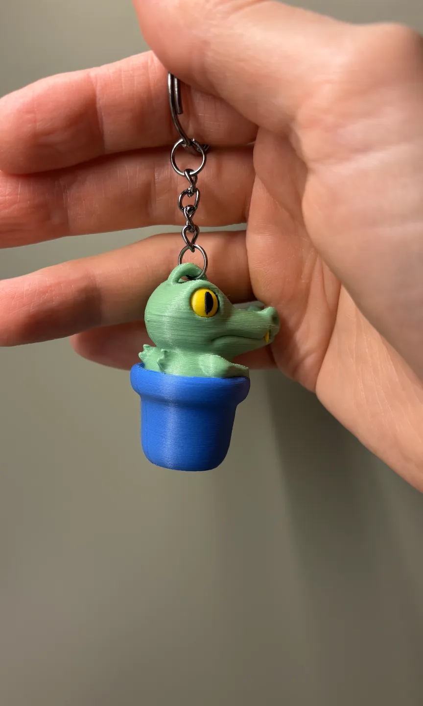 Hunty Crocodile in a pot keychain by Ginger White Prod. - MakerWorld