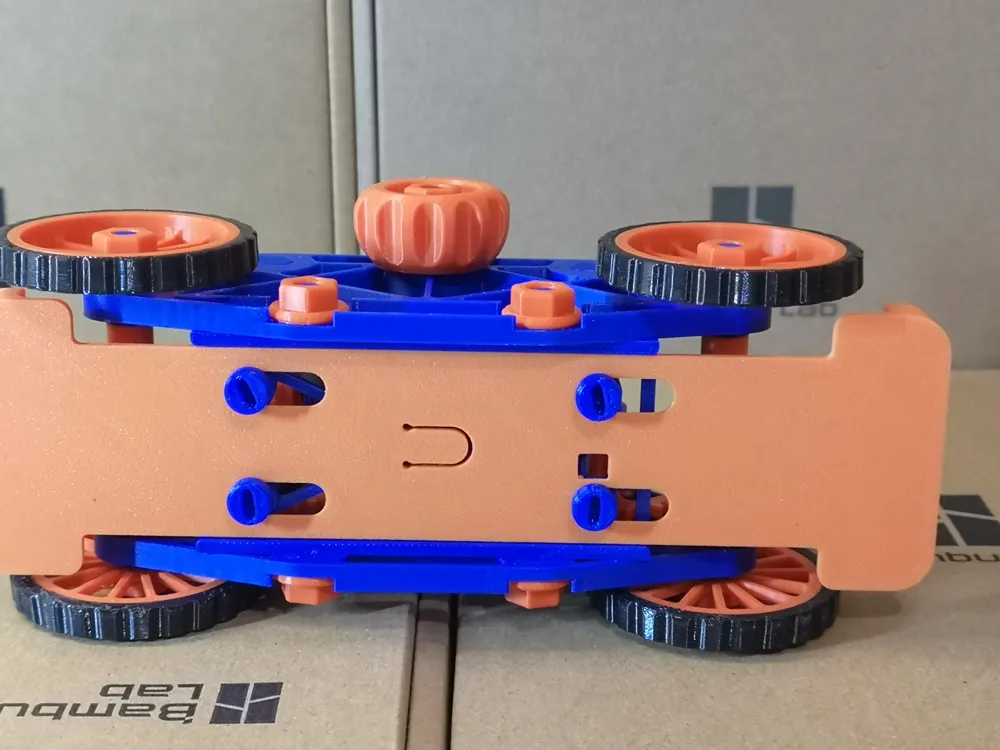 Wind-up car with reverser - Spring car - Free 3D Print Model - MakerWorld