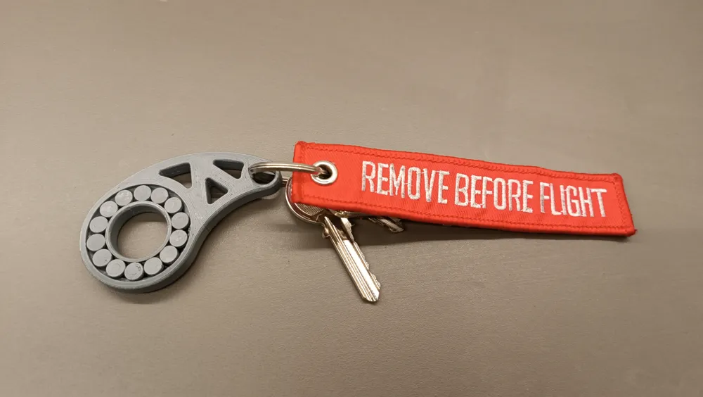 Keychain spinner - Free 3D Print Model - MakerWorld