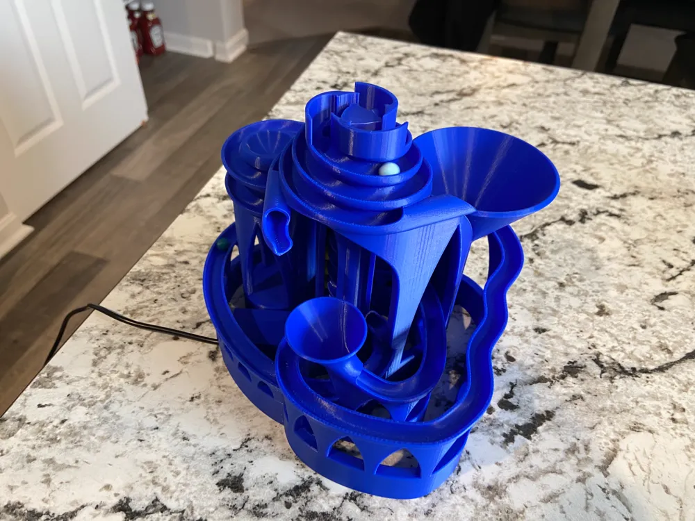 The Cyclone Motorized Marble Run - Free 3D Print Model - MakerWorld