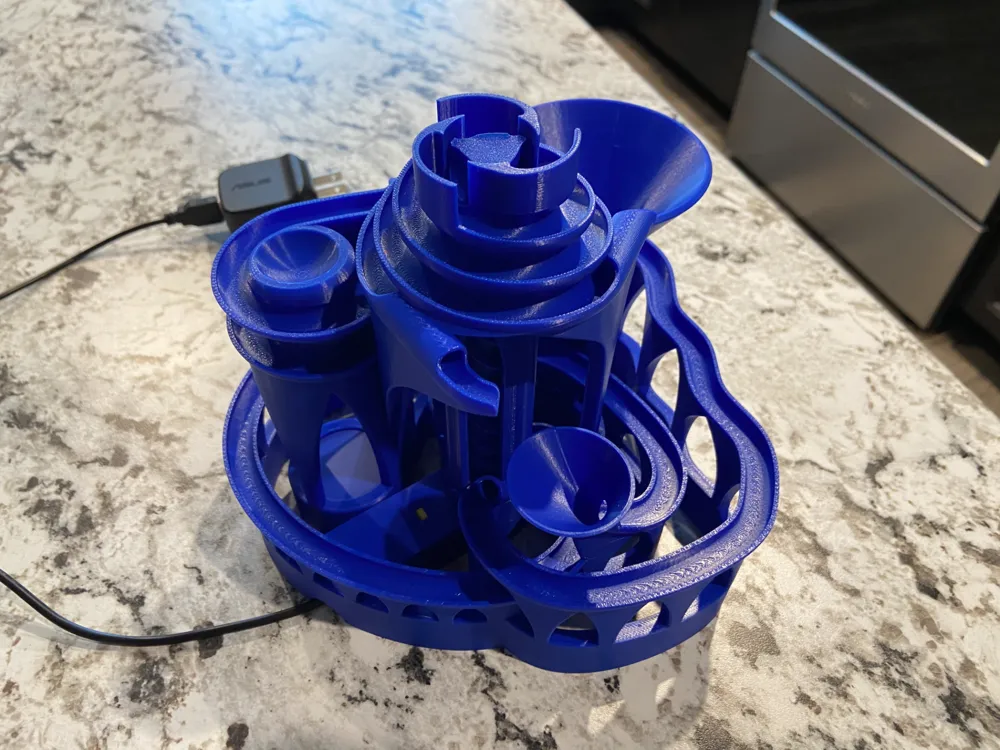 The Cyclone Motorized Marble Run - Free 3D Print Model - MakerWorld