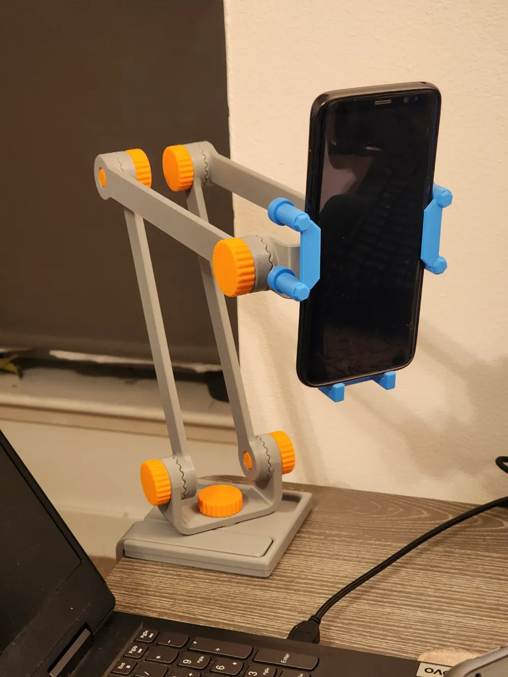 Phone Arm Holder Remixed by Bumblebee MakerWorld: Download Free 3D Models