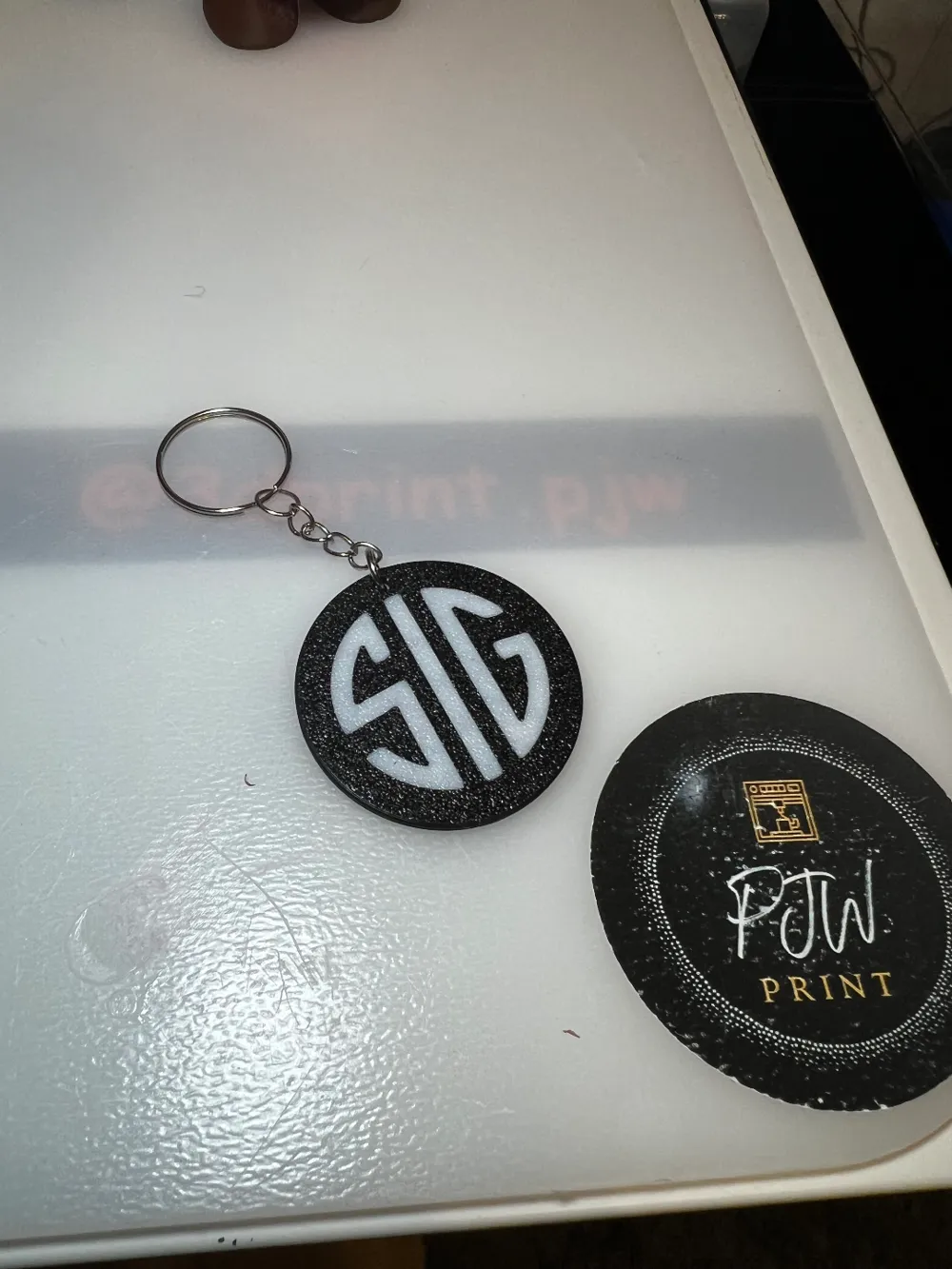 Sig sauer keychain double-sided by 3dprint.pjw - MakerWorld