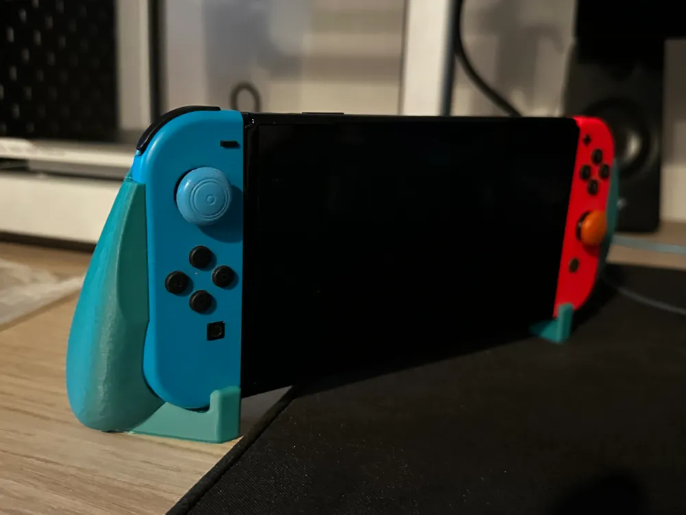 Ergonomic grip for Nintendo Switch and oled version Remixed by Manthas - MakerWorld