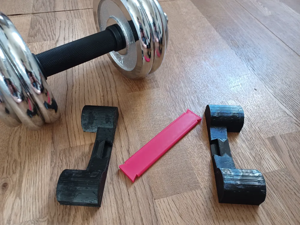 No roll , no bump "universal" dumbbell holder. by I.bet.I.can.print ...