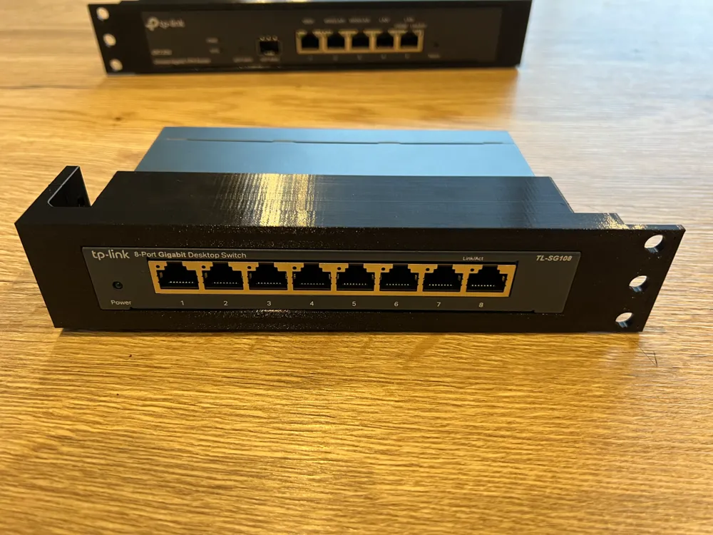 Rack mount for TP-Link TL-ER7206 + TL-SG108(PE) by Piitaya - MakerWorld