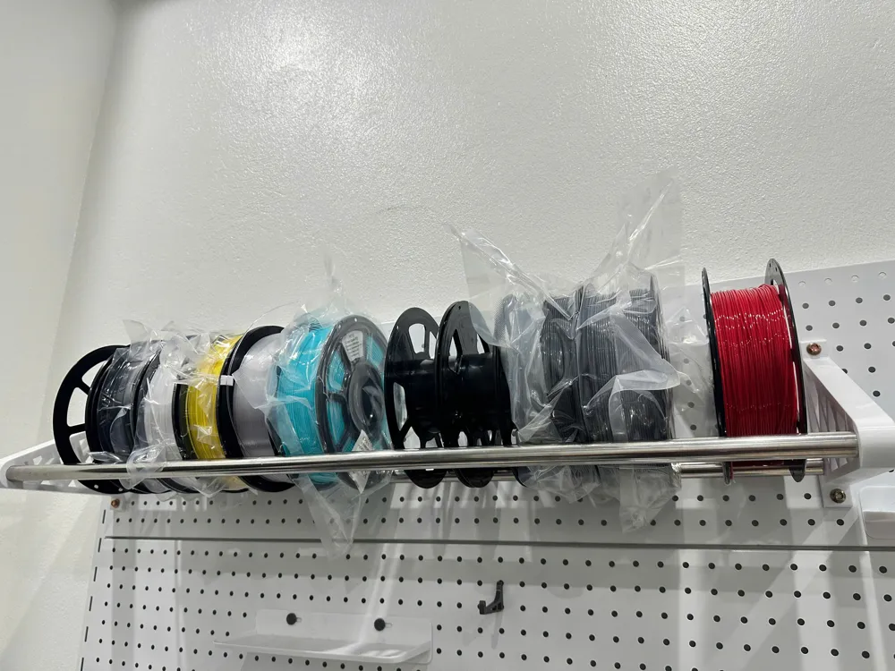 Filament spool wall holder - Free 3D Print Model - MakerWorld