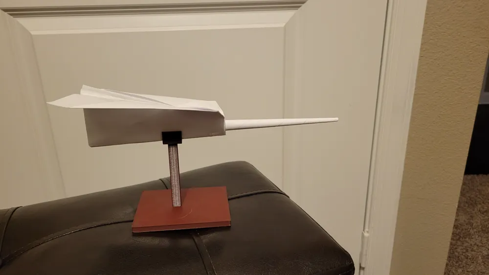 Paper air plane display stand by Zachary - MakerWorld