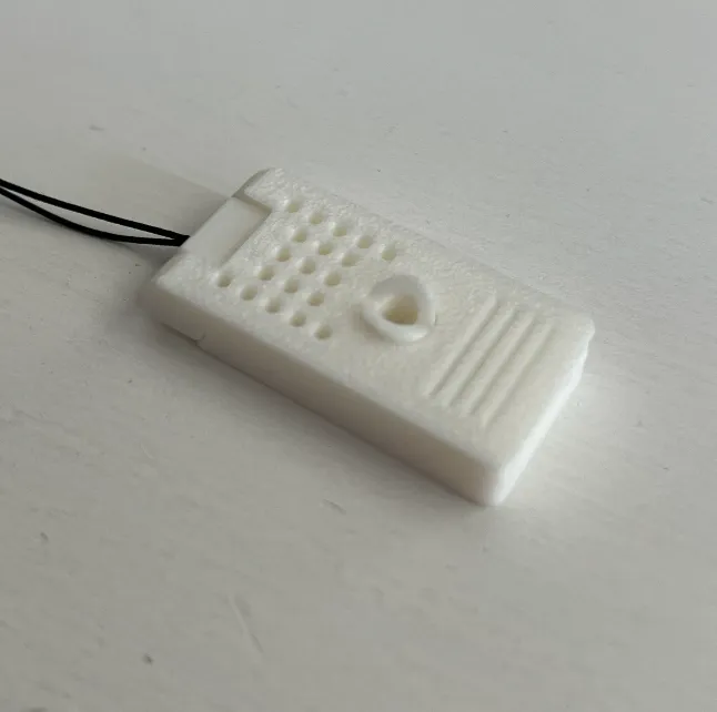 Keychain Hole Puncher by lr_f3d MakerWorld: Download Free 3D Models