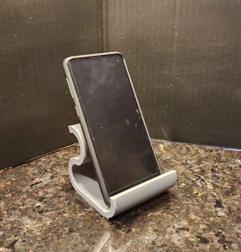 Modern Aesthetic Phone Stand by RhinoPrinting - MakerWorld