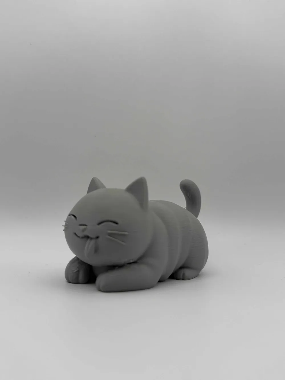 Cheeky Tongue Cat – Playful Chubby Figurine by humilak MakerWorld ...