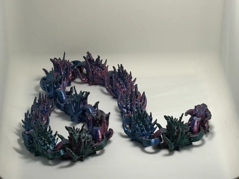 Articulating Demon Snake Fidget - Free 3D Print Model - MakerWorld