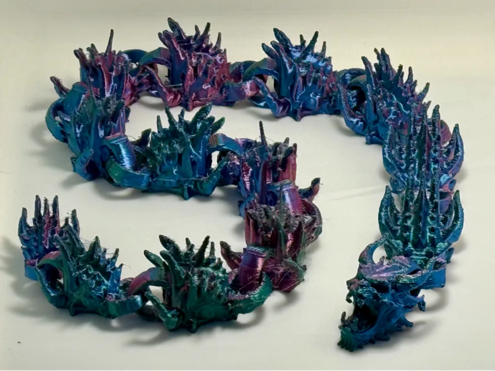 Articulating Demon Snake Fidget - Free 3D Print Model - MakerWorld