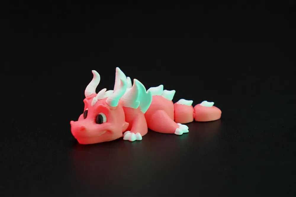 Articulated Mini Dragon - Free 3D Print Model - MakerWorld