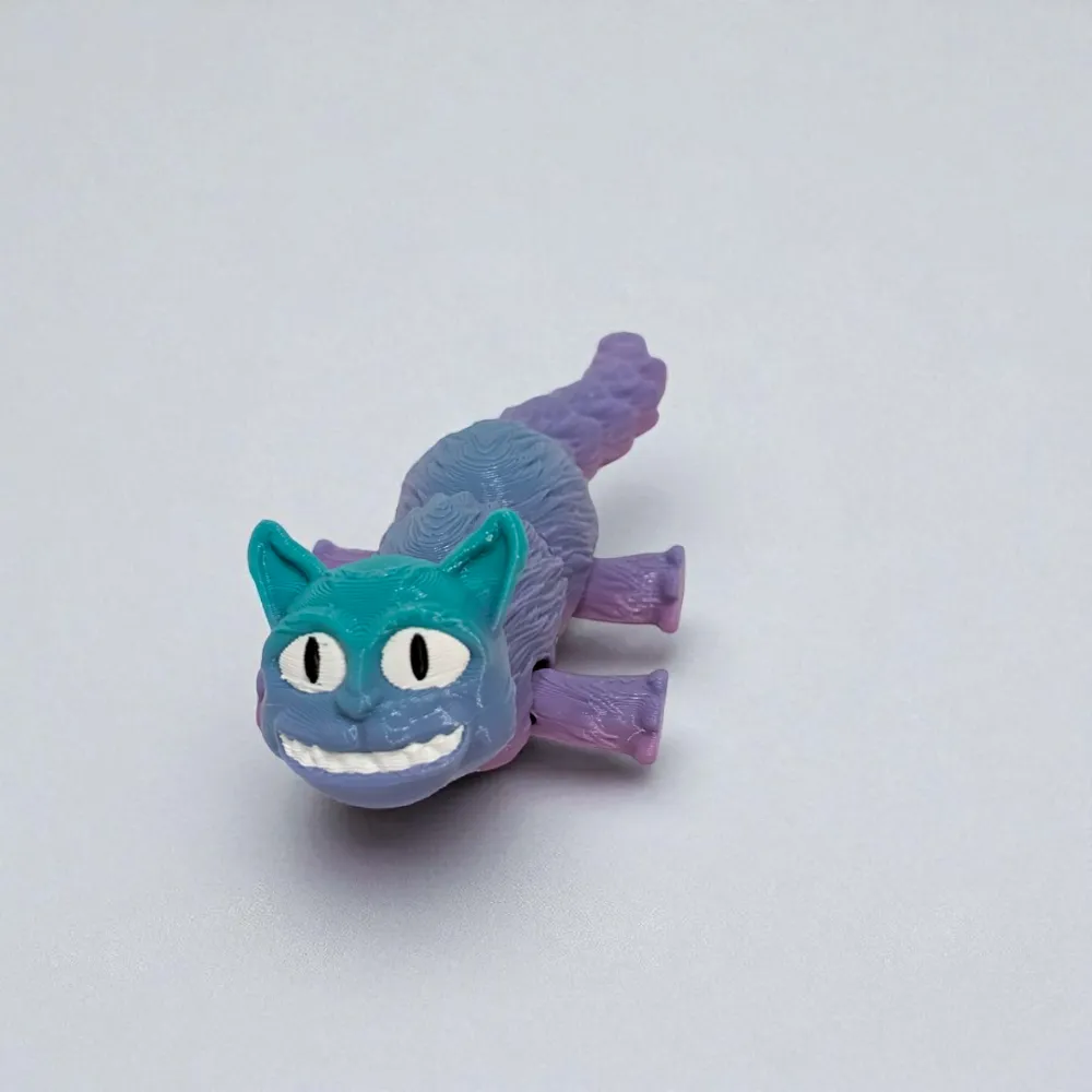 Cheshire Flexi Cat by Rad Makes MakerWorld: Download Free 3D Models