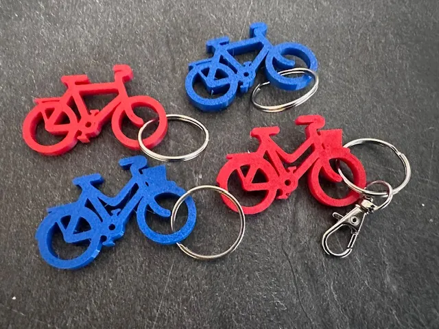 Bicycle keychain - girl and boy by NxtGnPrtHub - MakerWorld