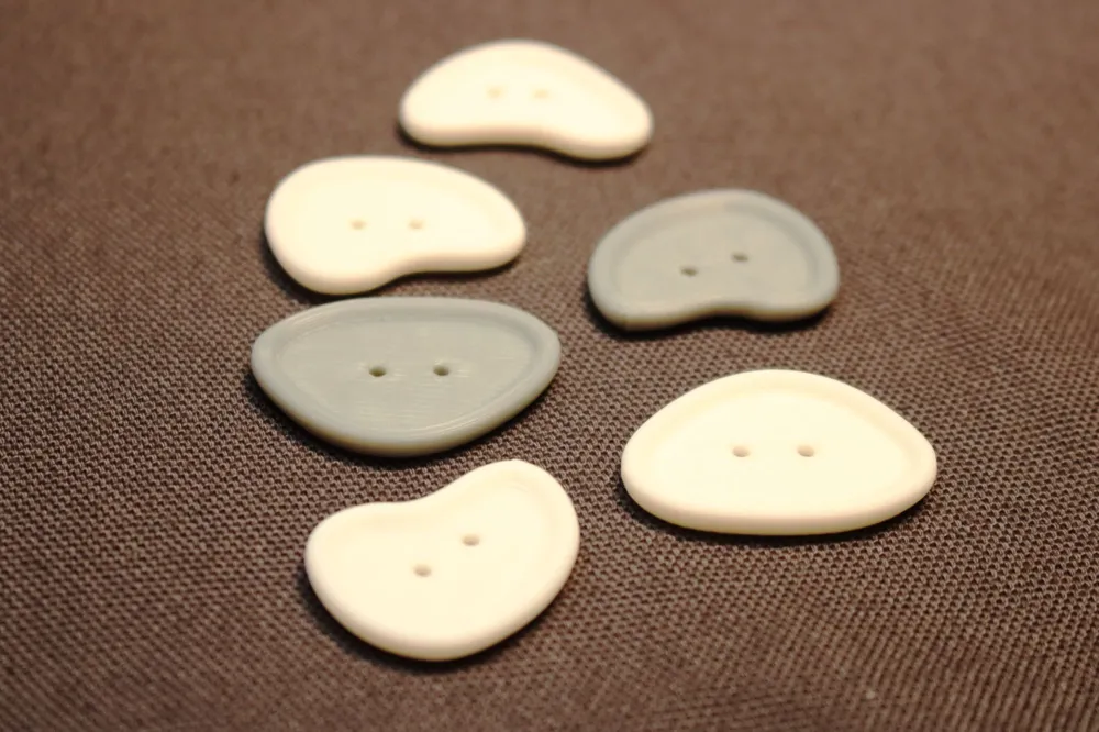 Pebble Buttons by Ken Mills - MakerWorld