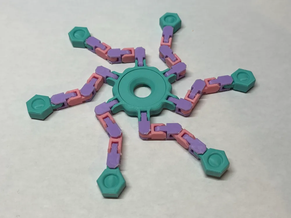 Flexible Fidget Spinner by RED_elevenMakerWorld: Download Free 3D Models