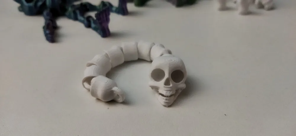 Flexi Skeleton Worm Keychain by MiguelJasus MakerWorld: Download Free ...