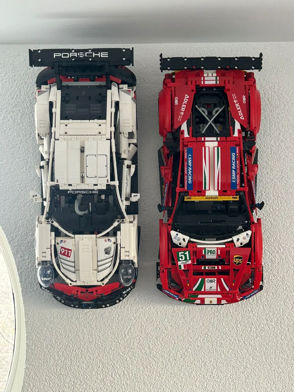 Brick wallmnt bracket technic car with 35mm tire by Mause77 - MakerWorld