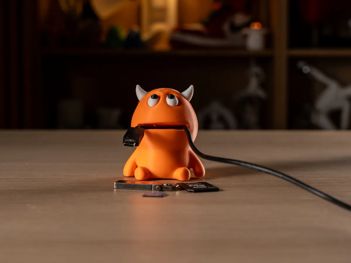 Cable Monster - Desk helper - Orange - Free 3D Print Model - MakerWorld