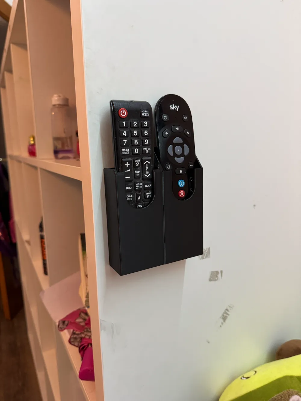 Wall-mounted Sky and Samsung remote control holder by 35Enrico ...