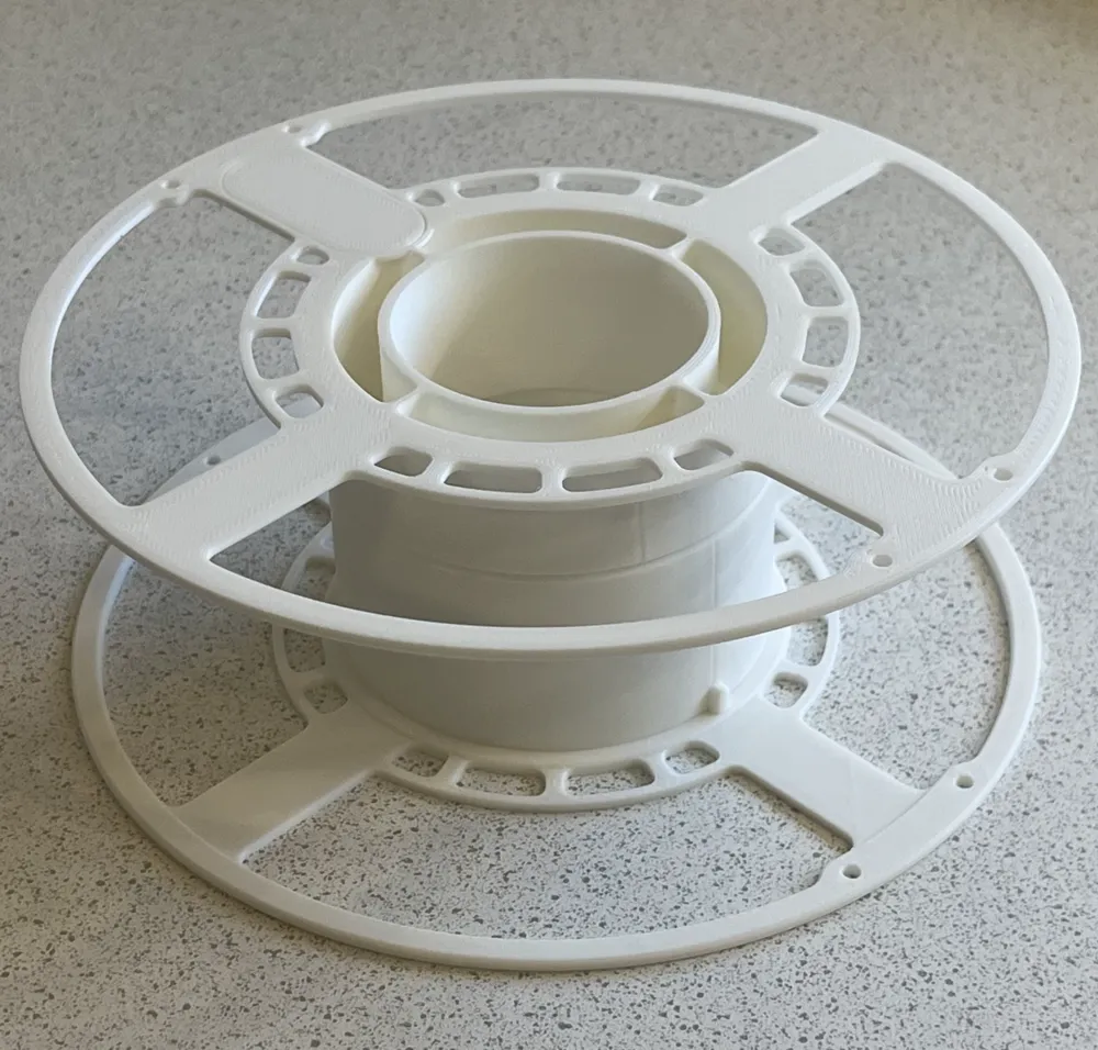 Custom filament spool Remixed by The Viking - MakerWorld