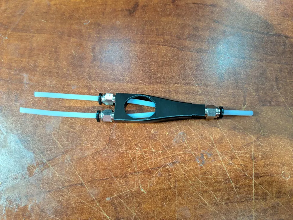 Divisor de PTFE perfecto - Modelo de impresión 3D gratuito - MakerWorld