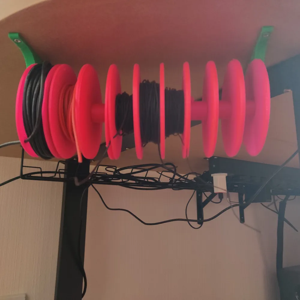 Under desk wire spools & holder by aaronsmith544 - MakerWorld