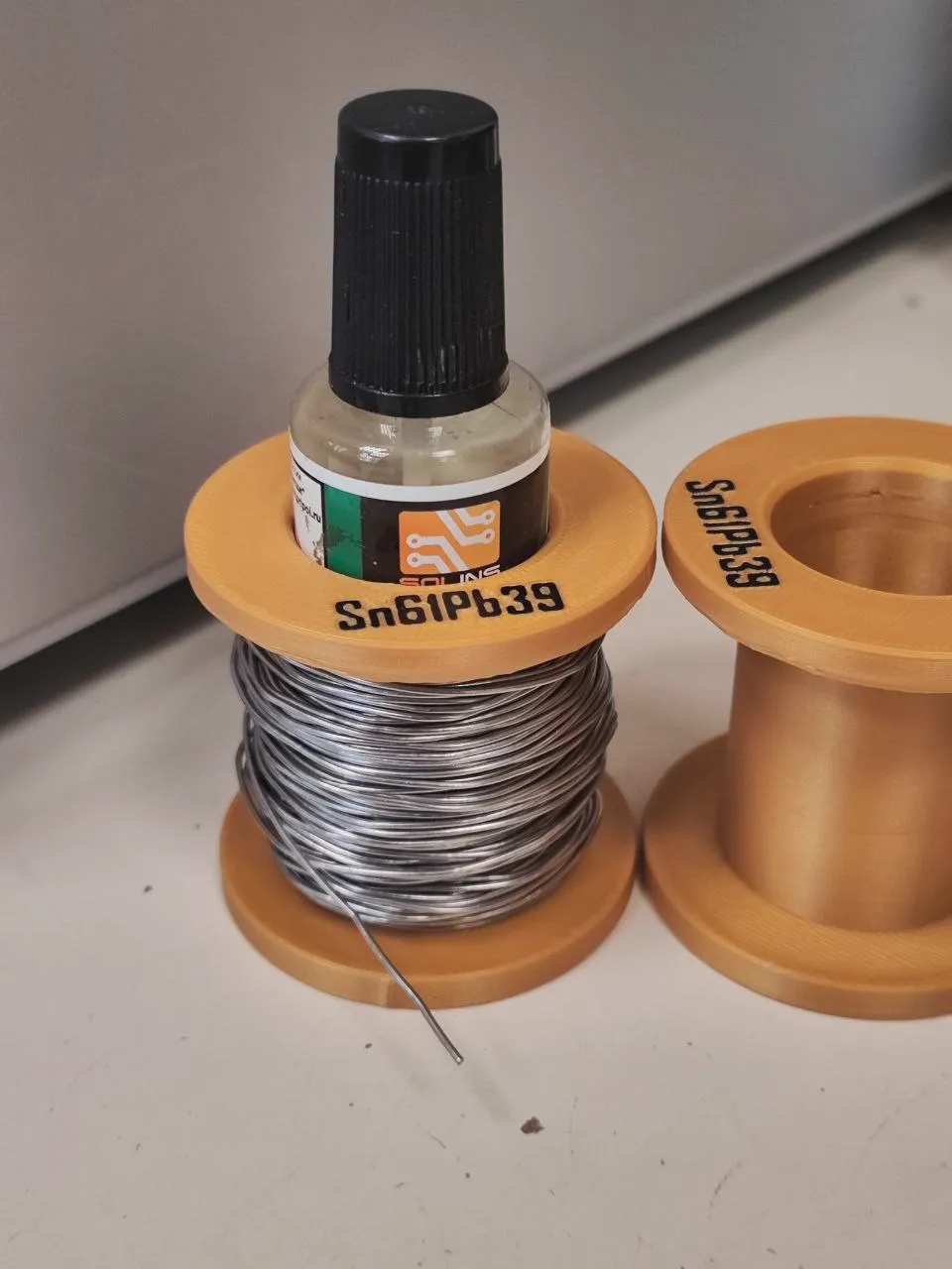 Solder wire spool with flux bottle holder by IceCreamCoffeeV - MakerWorld