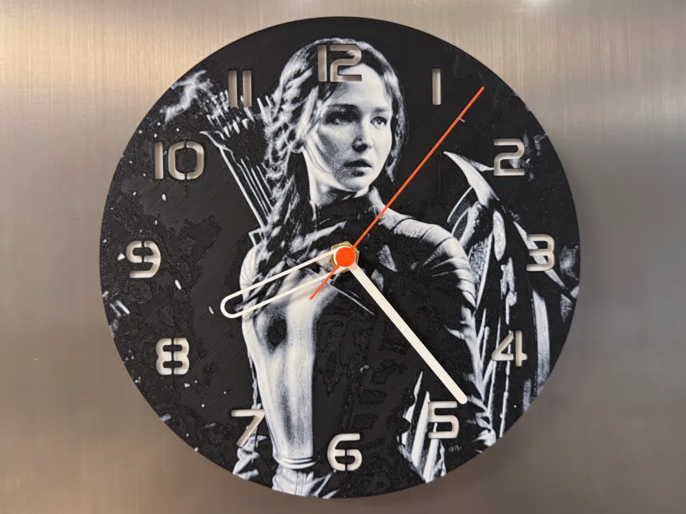 Wall / Desk Clock Katniss Everdeen HueForge by cP3D - MakerWorld