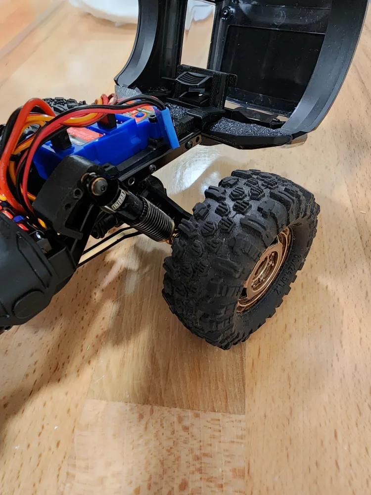 TRX4M Front Shock Mount Relocate - Free 3D Print Model - MakerWorld