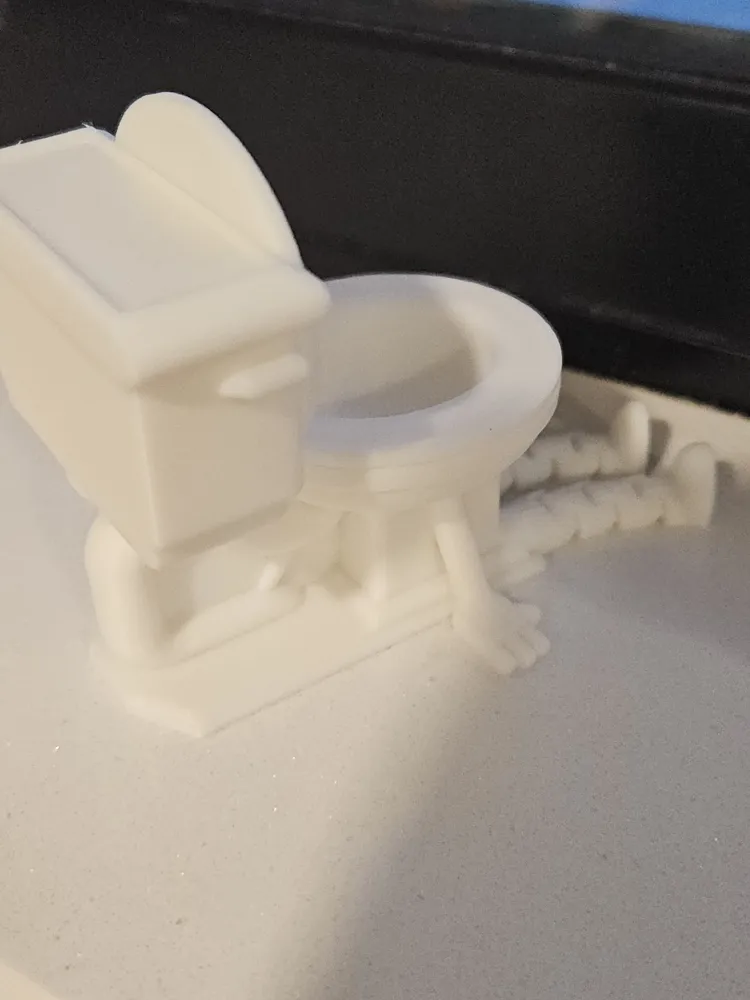 Toilet Buddy with articulated legs - Free 3D Print Model - MakerWorld