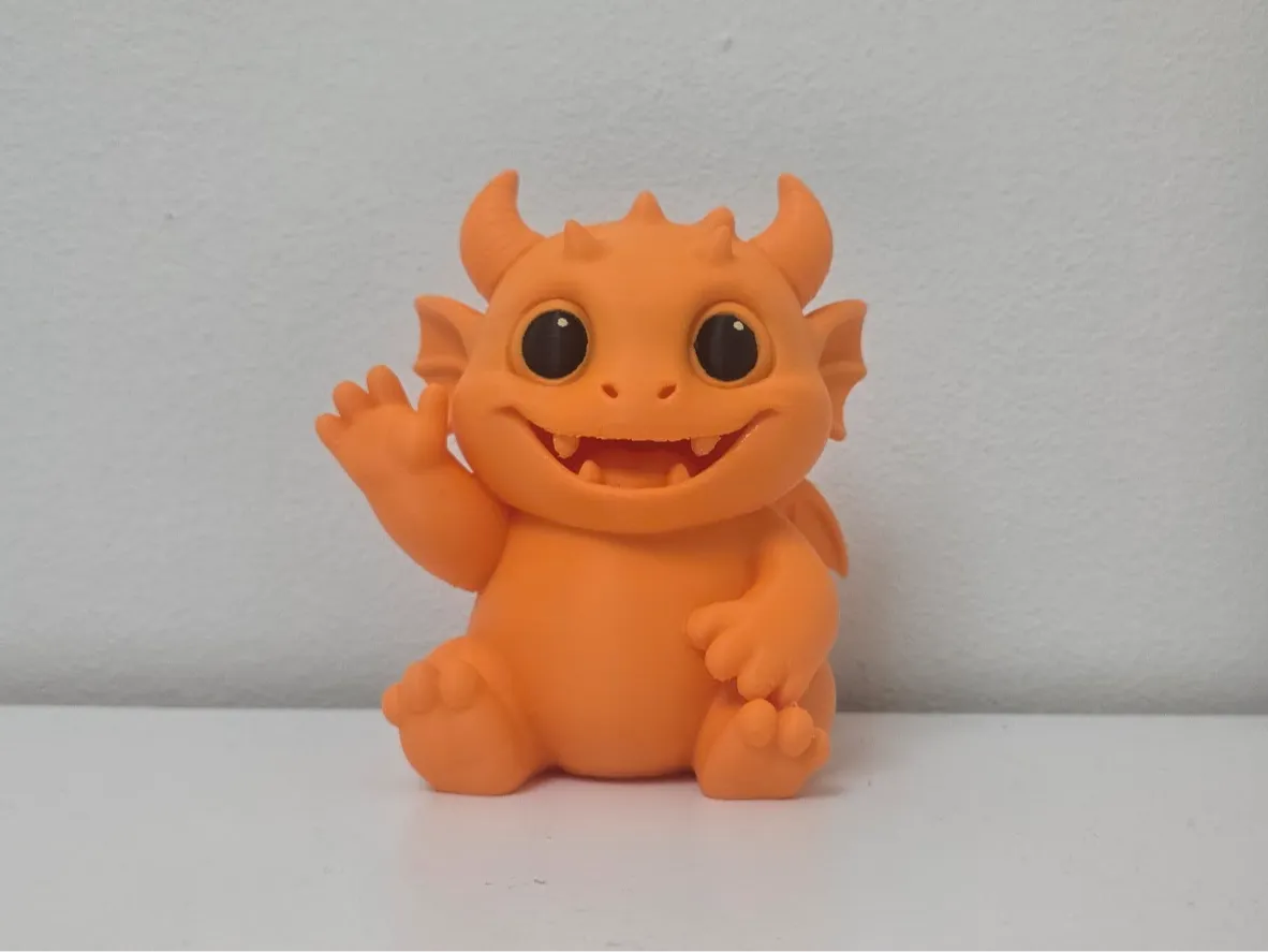 Waving Baby Dragon Holiday Figurine - Free 3D Print Model - MakerWorld