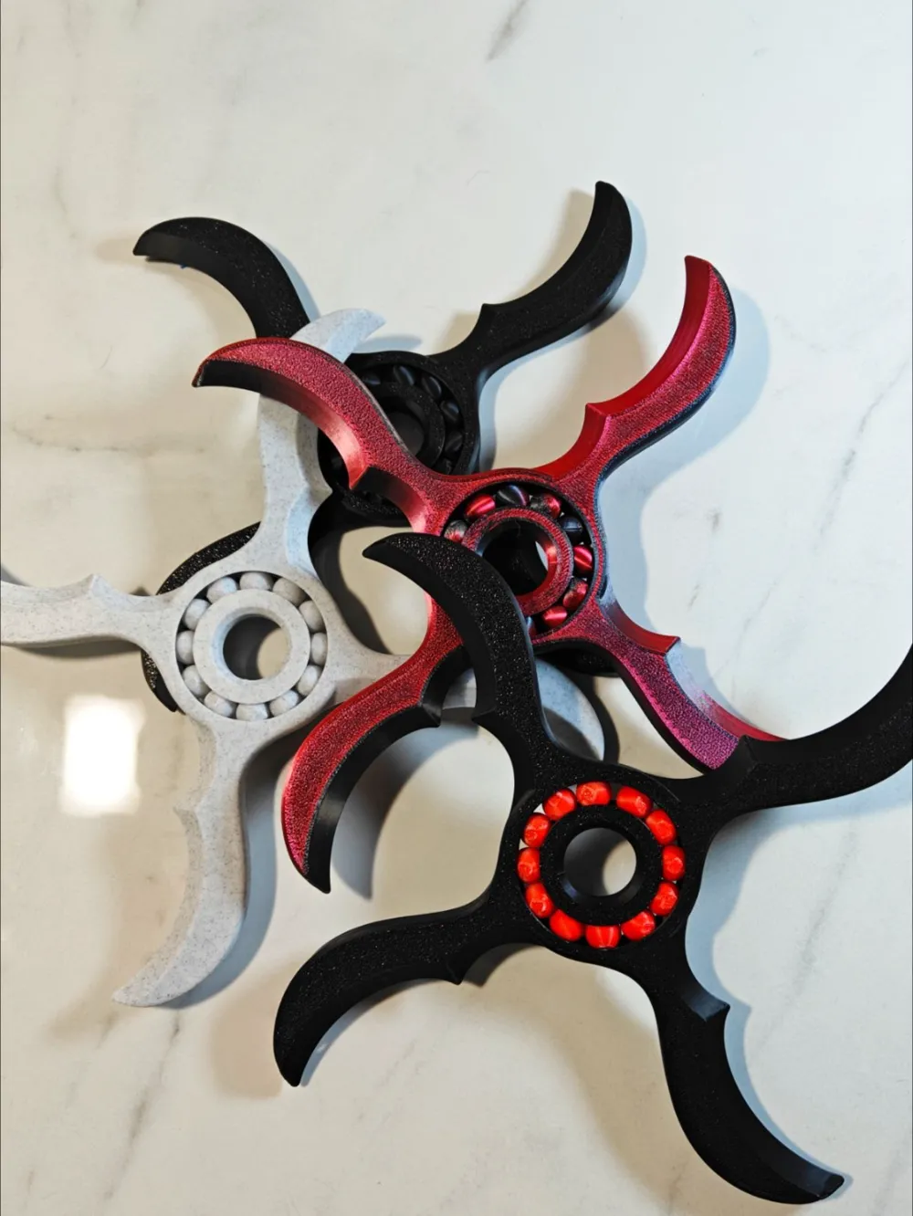 Fidget Spinning Finger Throwing Star - Free 3D Print Model - MakerWorld