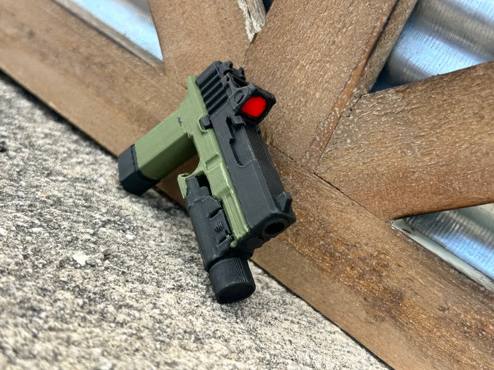 Dummy 13 Modern pistol - Free 3D Print Model - MakerWorld
