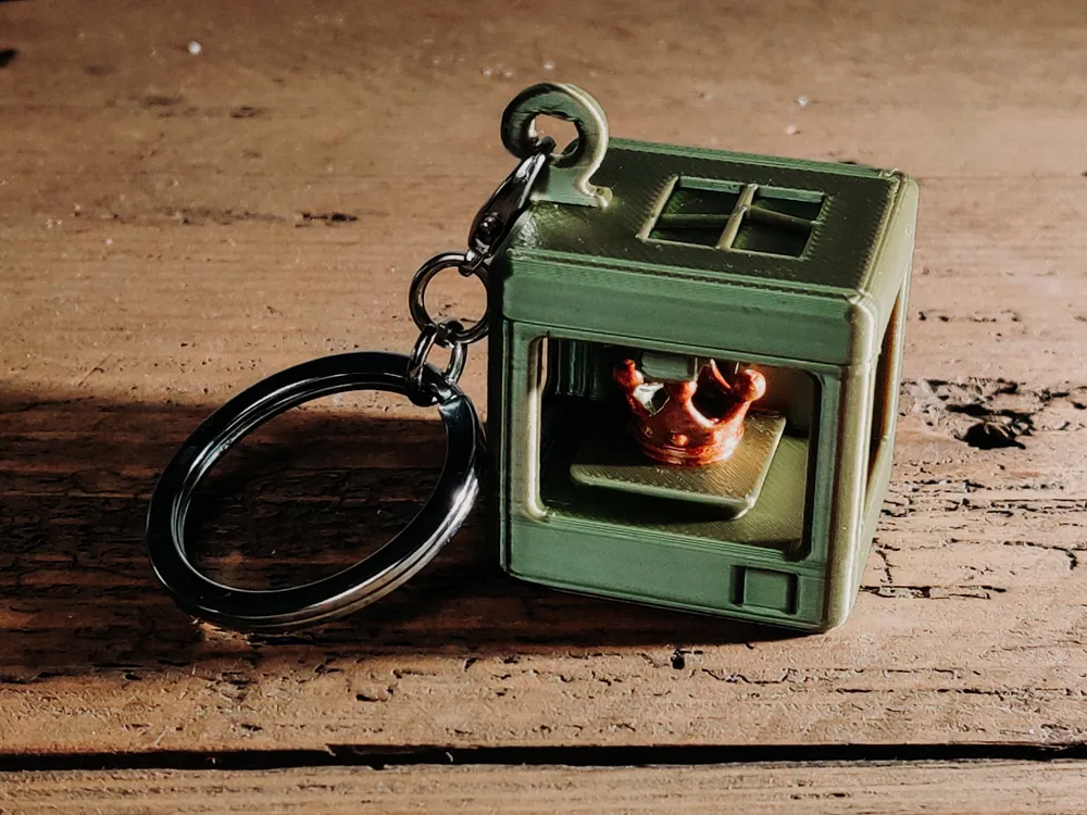 Bambu lab keychain printing a crown by woodbear MakerWorld: Download ...