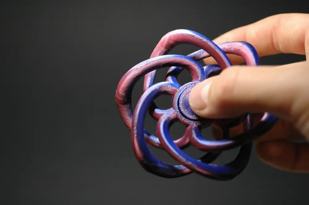 Helix petal fidget spinner - Free 3D Print Model - MakerWorld