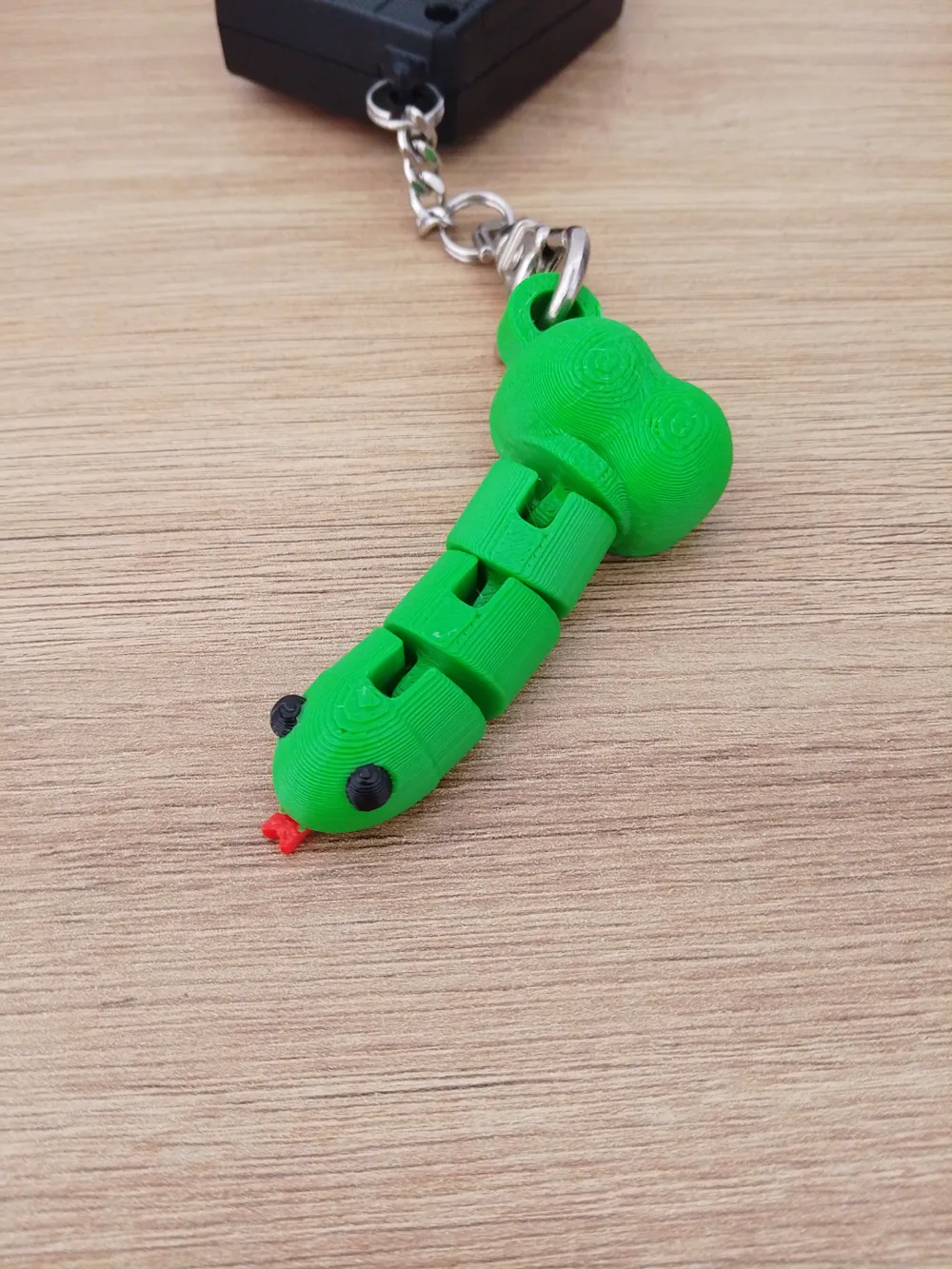 "Just-a-snake" articulated fidget keychain by Olle3D - MakerWorld