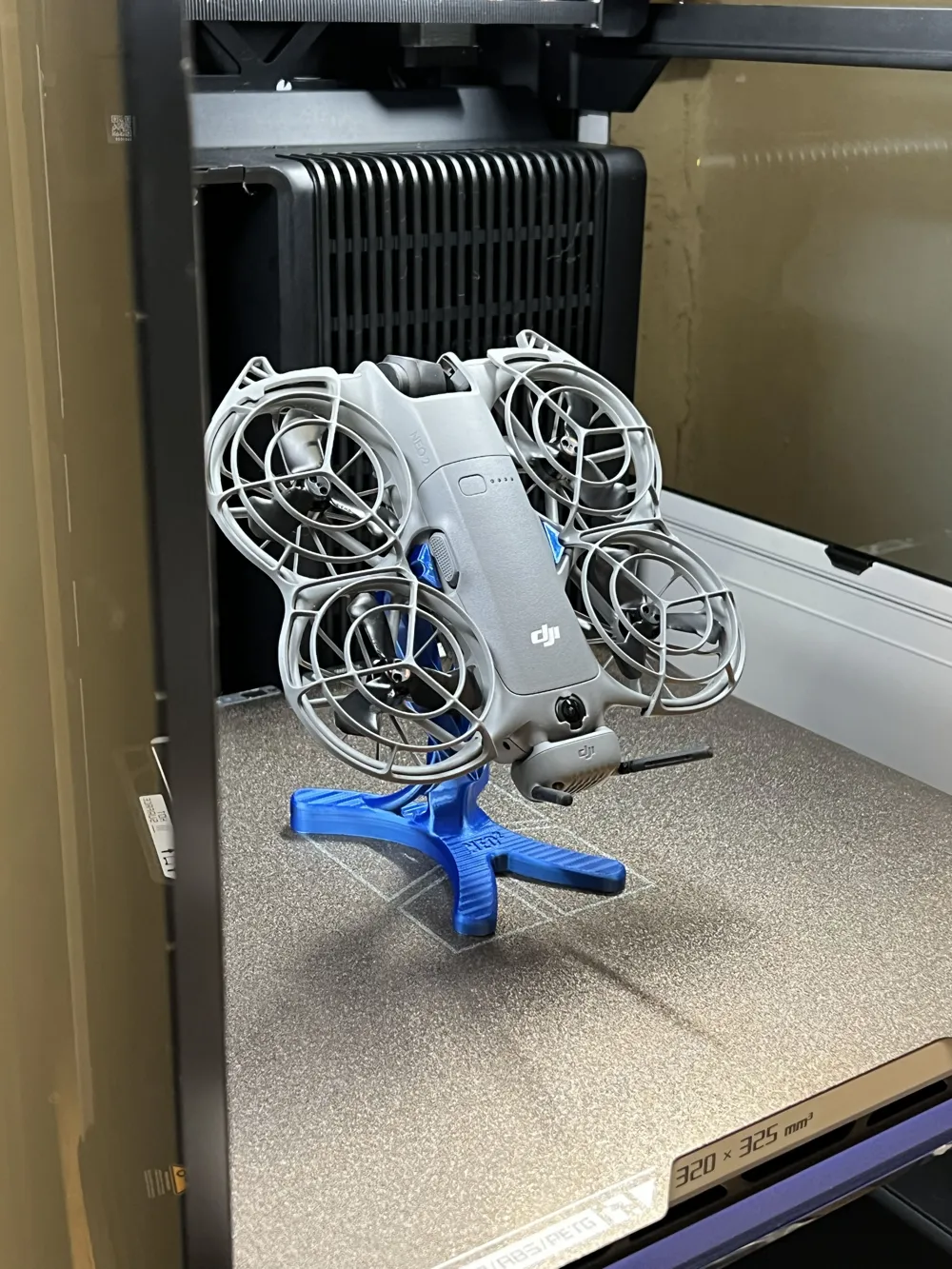 DJI Neo2 decorative desk stand - Free 3D Print Model - MakerWorld