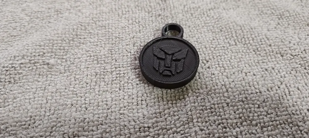 Autobot Keychain by NinoGiannino - MakerWorld