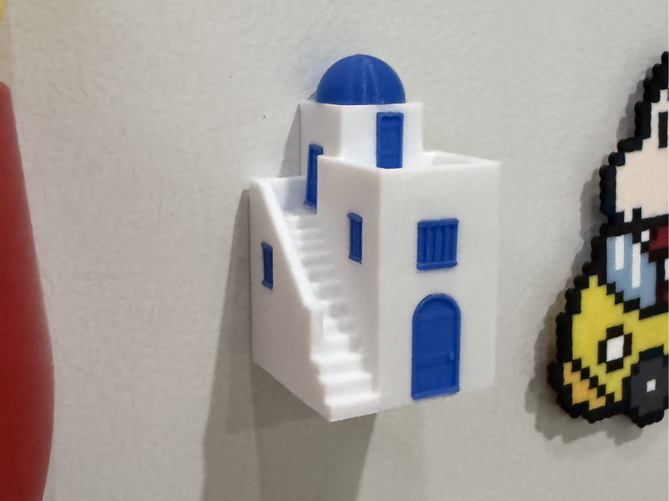 Santorini blue-domed miniature house, weighing a mere 12 grams, and ...