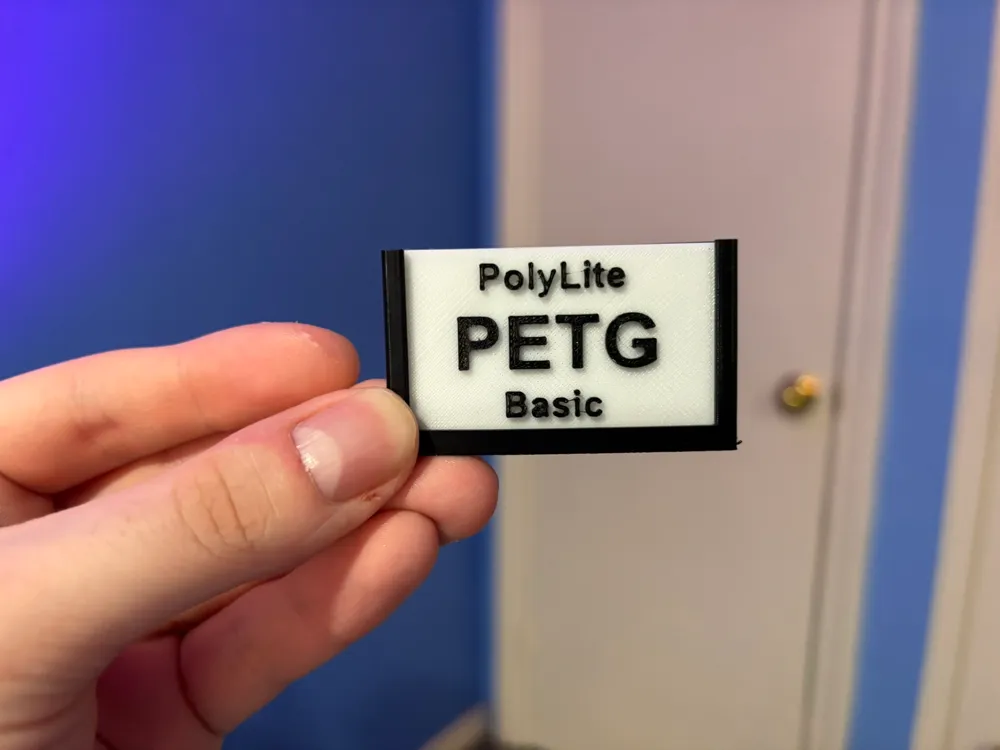 Swappable Label Holder for Spool Boxes Remixed by lyingfigure - MakerWorld