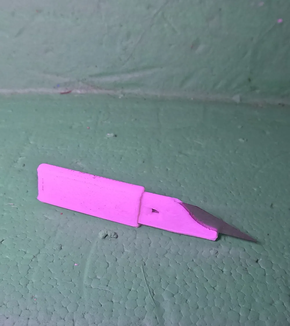 Ergonomic x-acto scalpel blade holder - Free 3D Print Model - MakerWorld