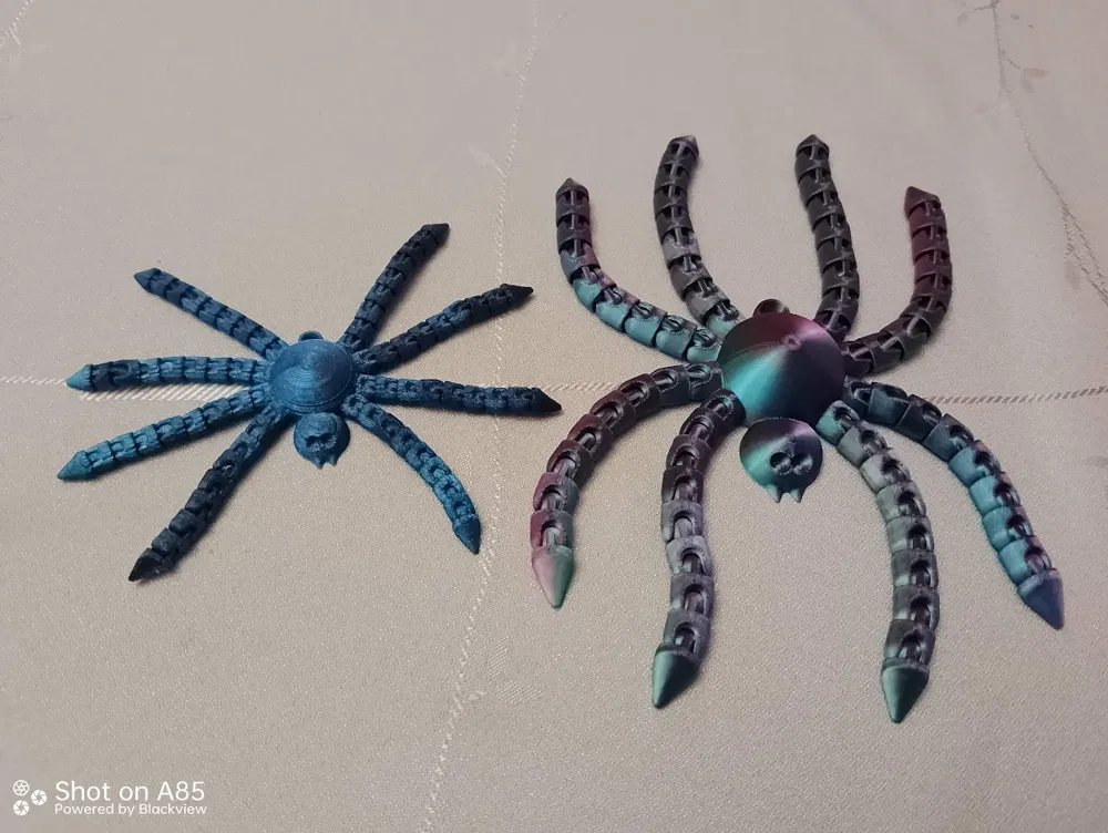 Articulated wild spider keychain by PiotrBanus MakerWorld: Download Free 3D Models