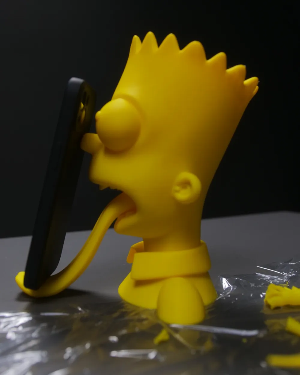 desk phone holder bart simpson - Free 3D Print Model - MakerWorld