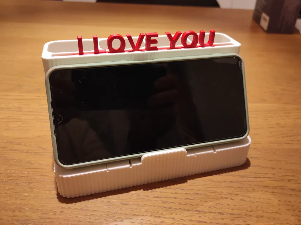 Phone stand with hidden love message - Free 3D Print Model - MakerWorld