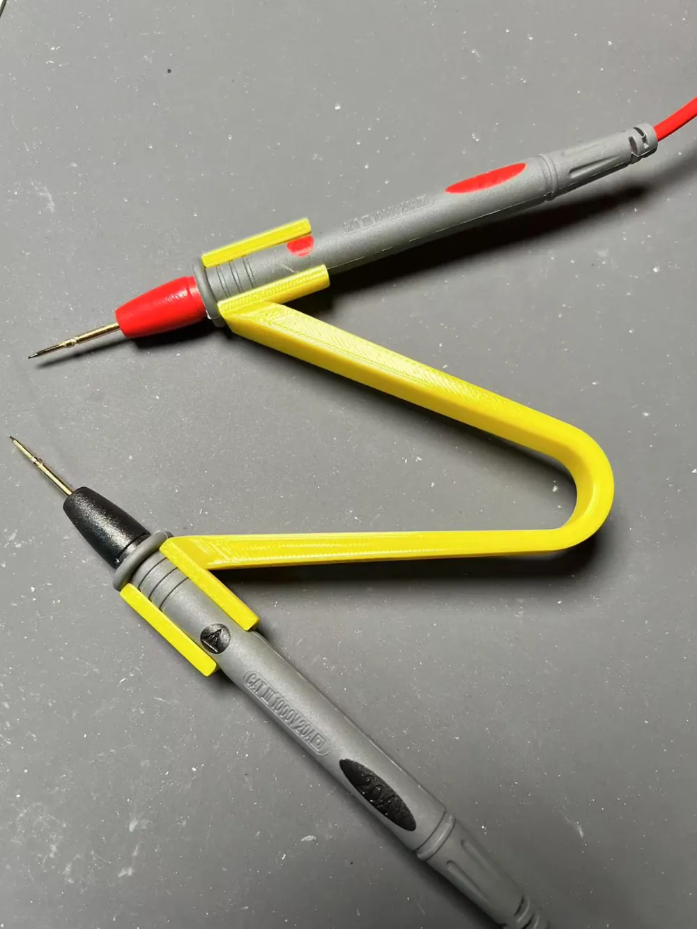 One-handed multimeter measurement adapter by nosoul - MakerWorld